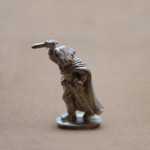 Female Assassin with Raised Dagger - Mig Raine